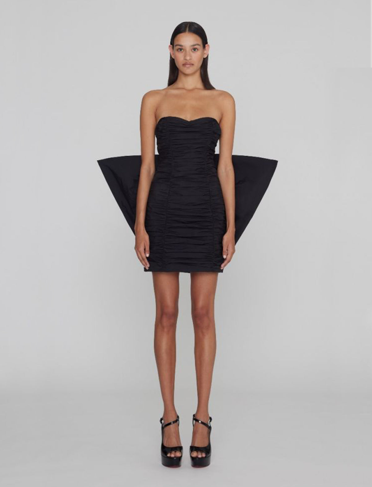 ROTATE Birger Christensen Taft Pleated Mini Bow Dress in Black | CLOSET Singapore